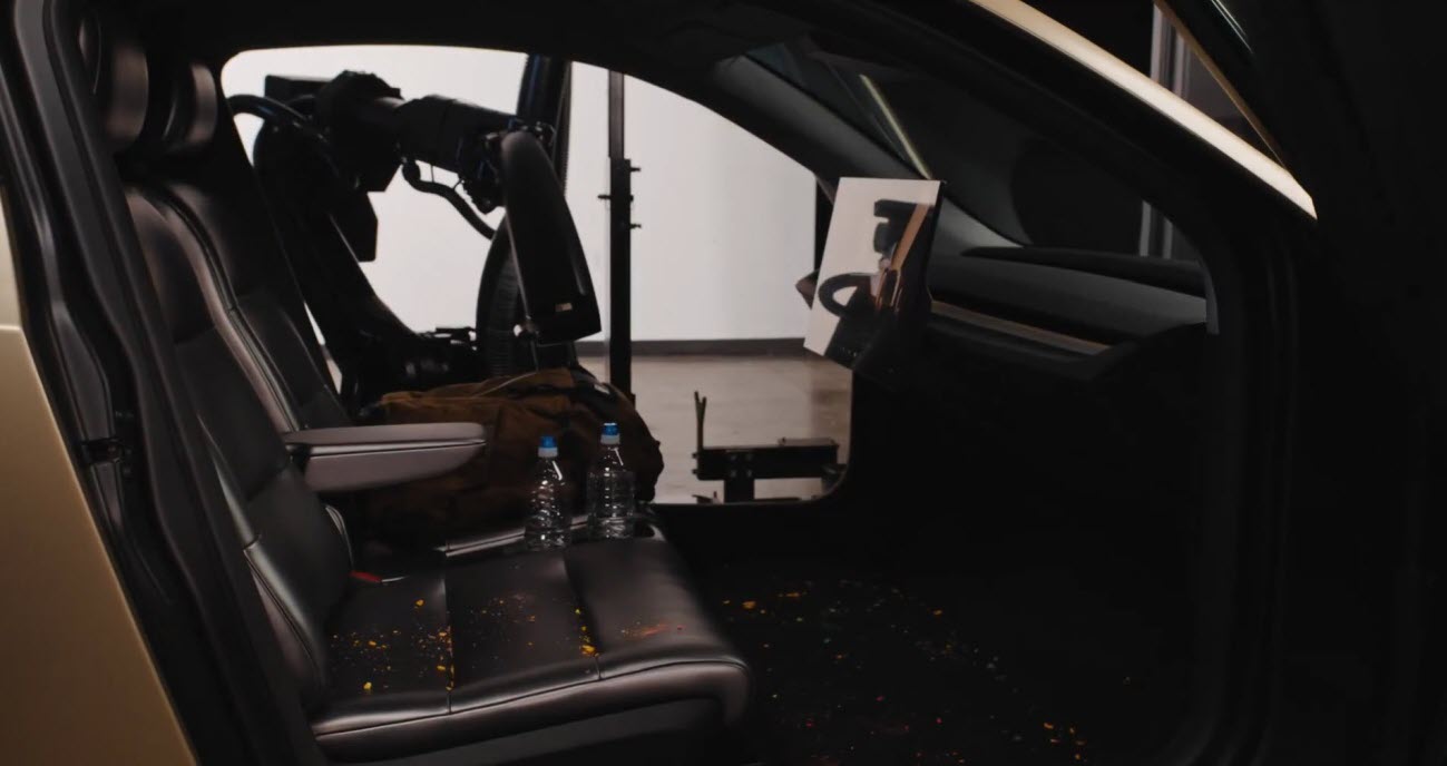 This robot sucks: Tesla shows off its new robot product for cleaning ...